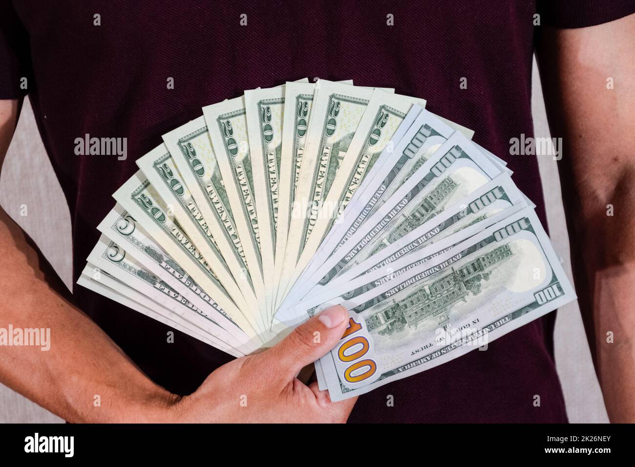 Man counting 100 dollar bills hi-res stock photography and images - Alamy