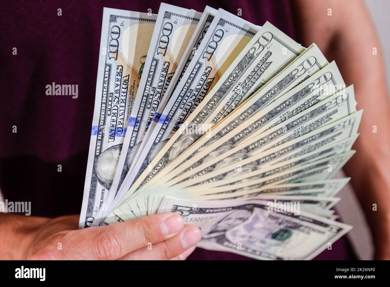 Hand dollars hi-res stock photography and images - Alamy