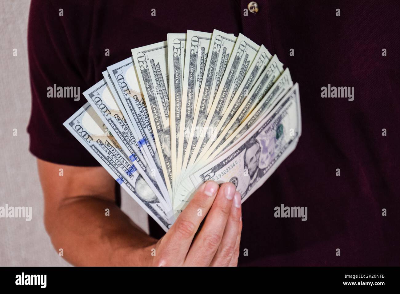 Man counting dollar bills hi-res stock photography and images - Alamy