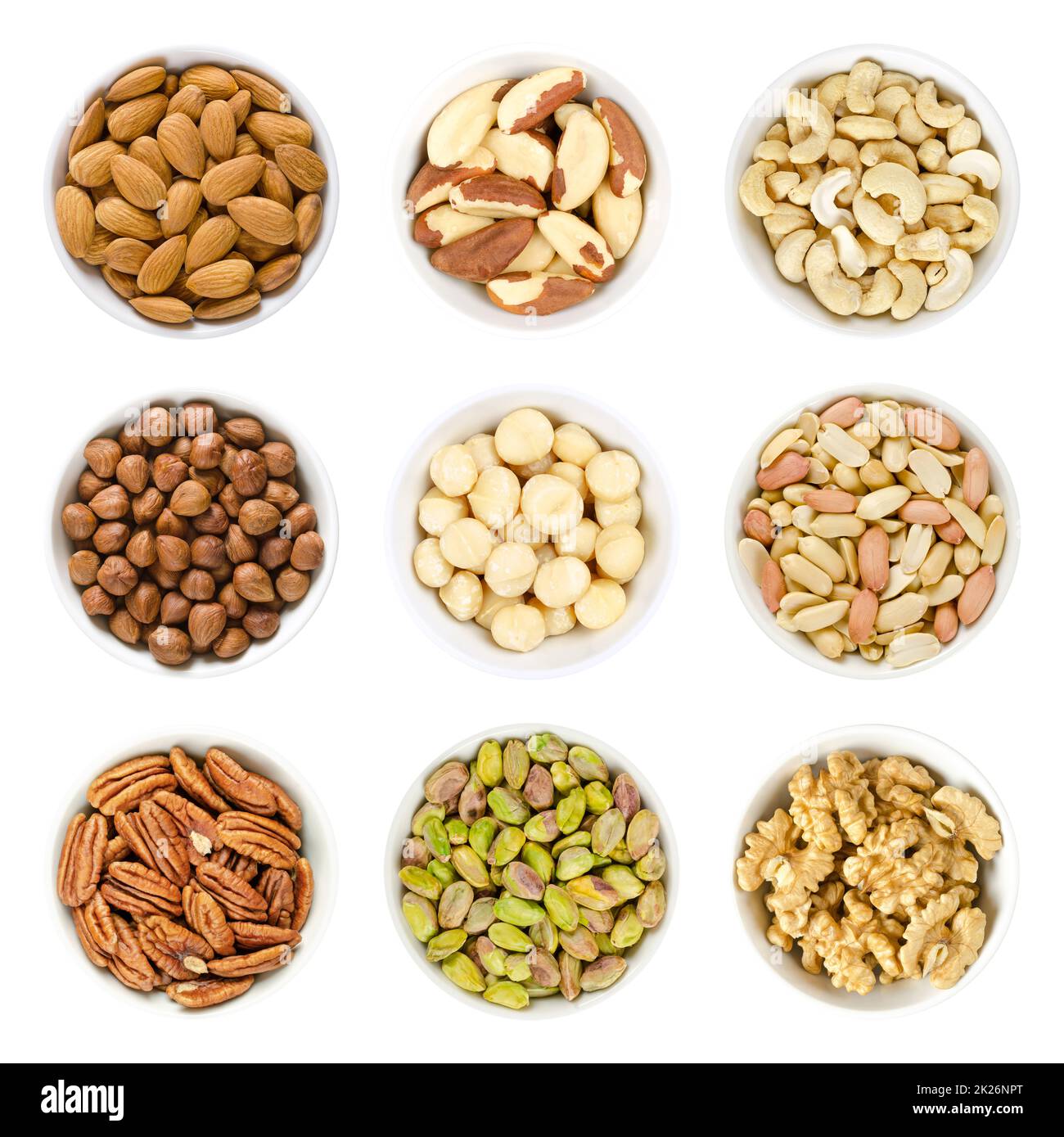 Nine different kinds of nuts in white bowls, isolated over white Stock ...