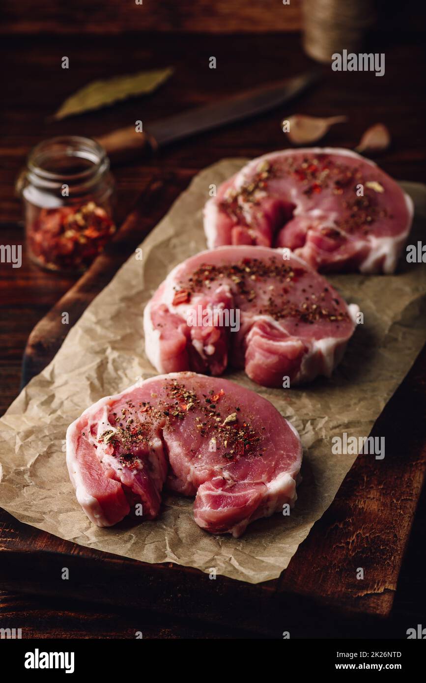 Raw pork steaks spices hi-res stock photography and images - Alamy