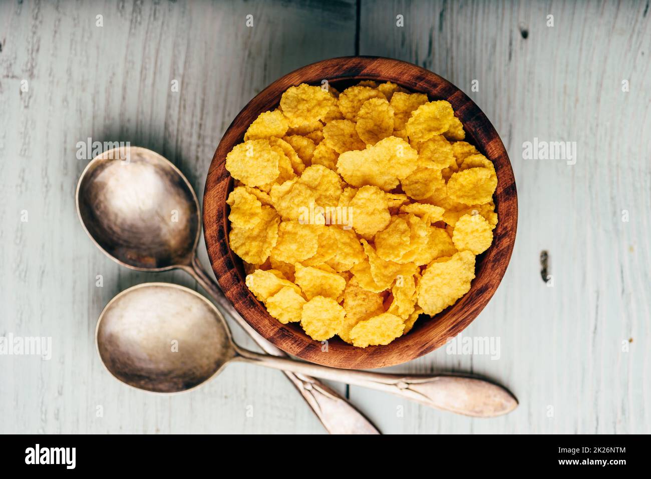 Rustic bowl of corn flakes Stock Photo - Alamy