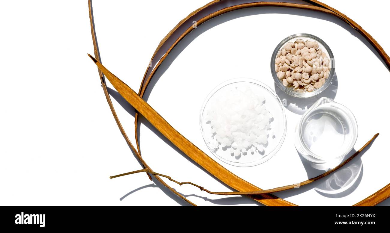 Cosmetic Chemical on white laboratory table. Microcrystalline wax in ...