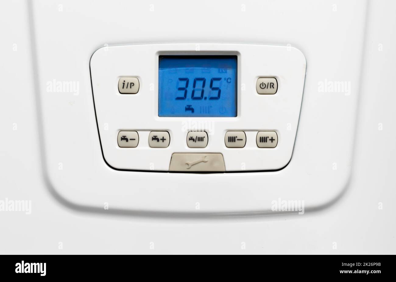 Close-up view of the bright blue display to regulate the water degrees ...