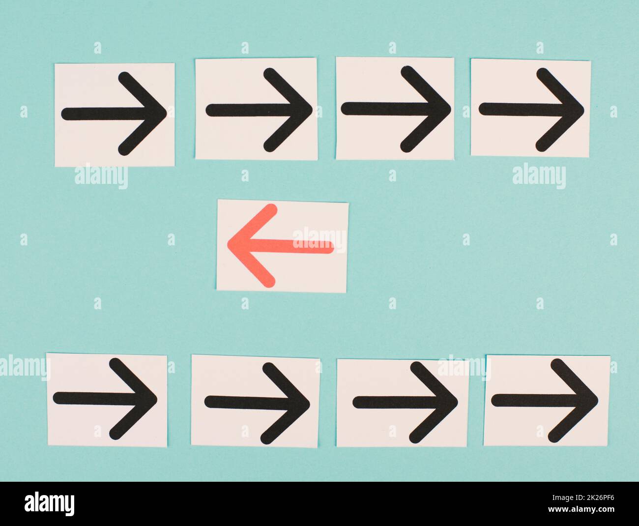 Many black arrows, one red is standing out, do different, be a winner ...