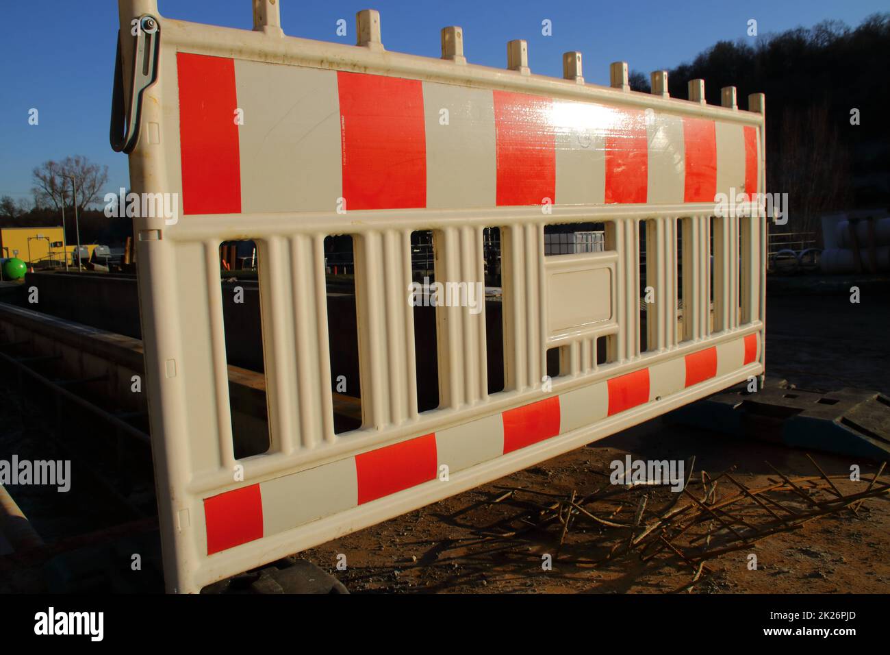 Construction site is secured with barrier material Stock Photo - Alamy