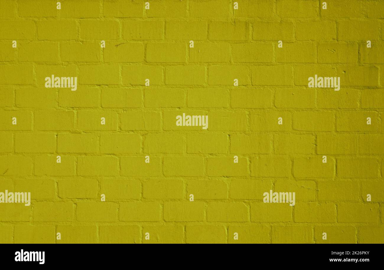 Empty yellow brick wall texture Stock Photo - Alamy
