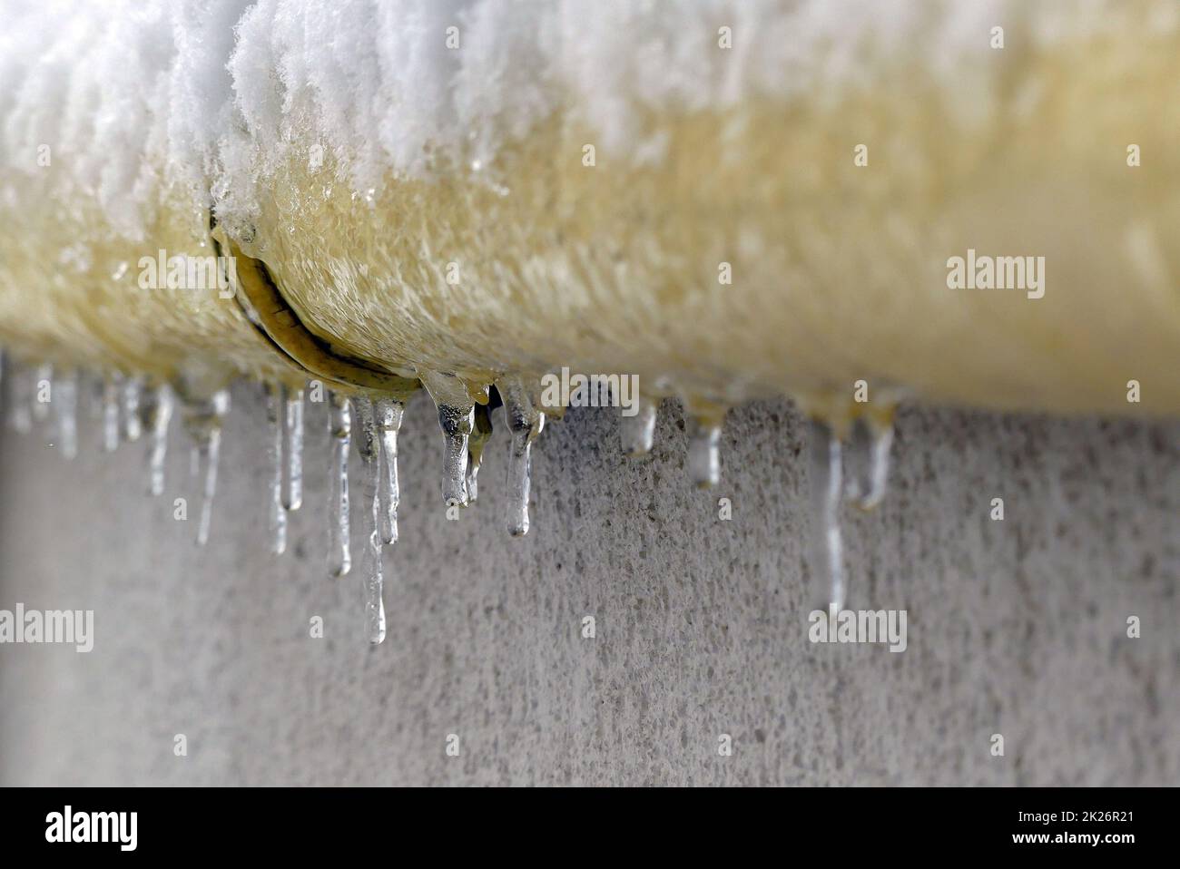 icing in winter, icing of pipes and formation of icicles, frost and ice ...