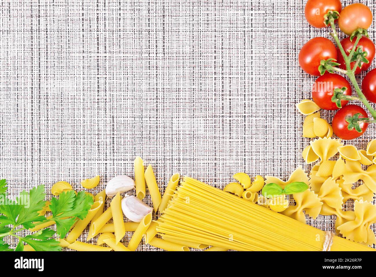 Frame of pasta on woven fabric Stock Photo - Alamy