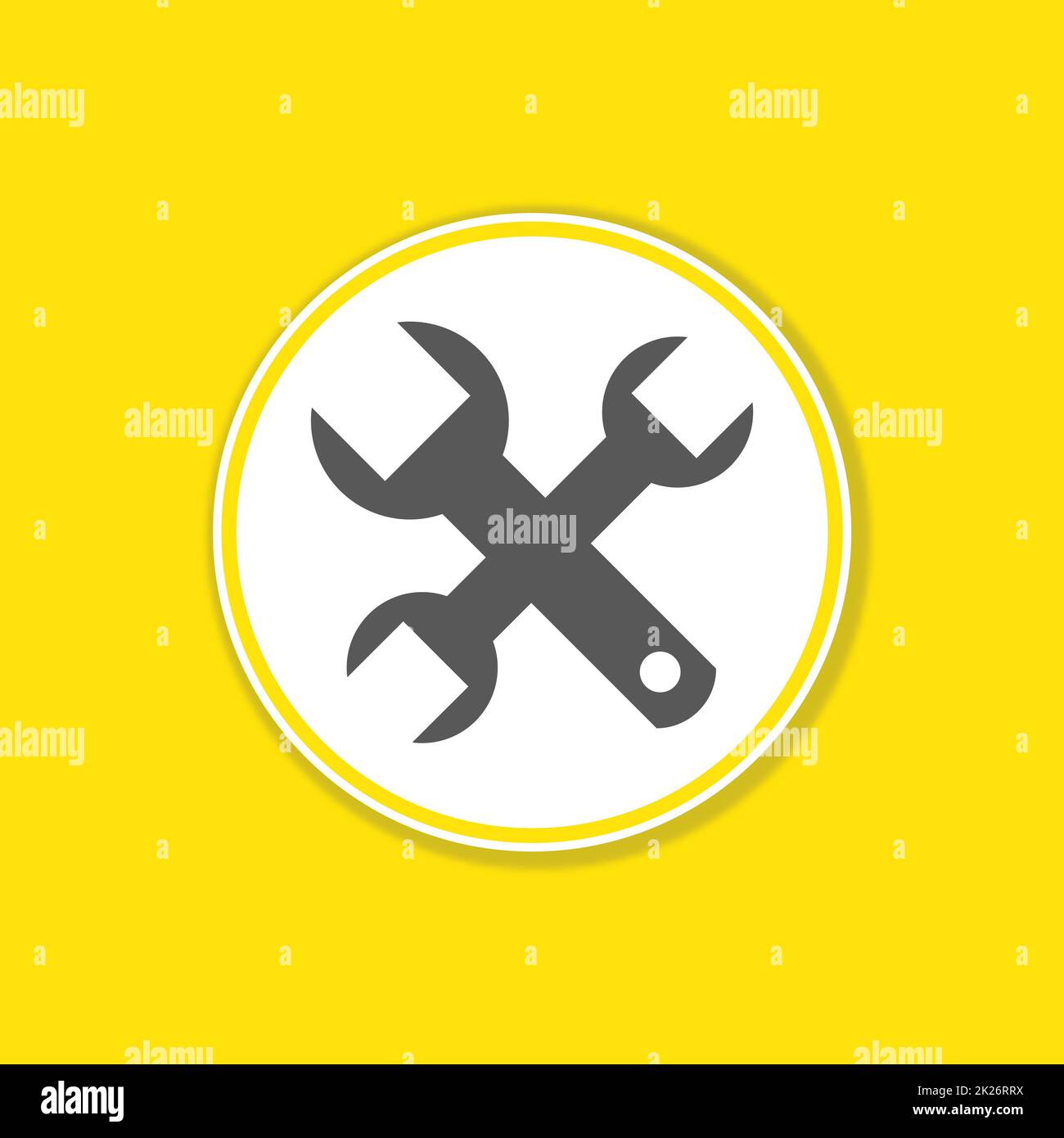Tool icon in circle on yellow background Stock Photo - Alamy