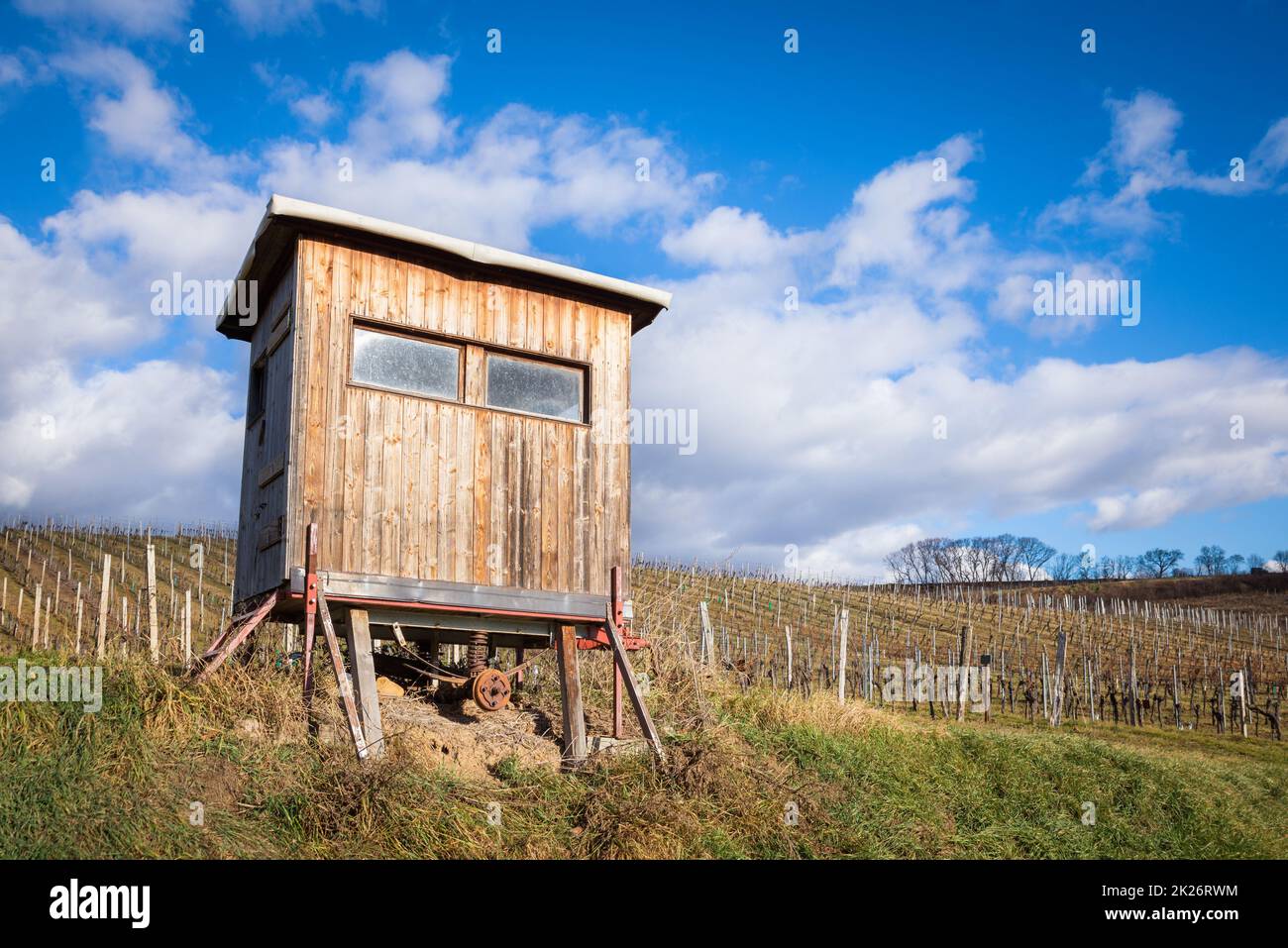 Wooden hunters high seat hide on field with cloudy dramatic sky ...