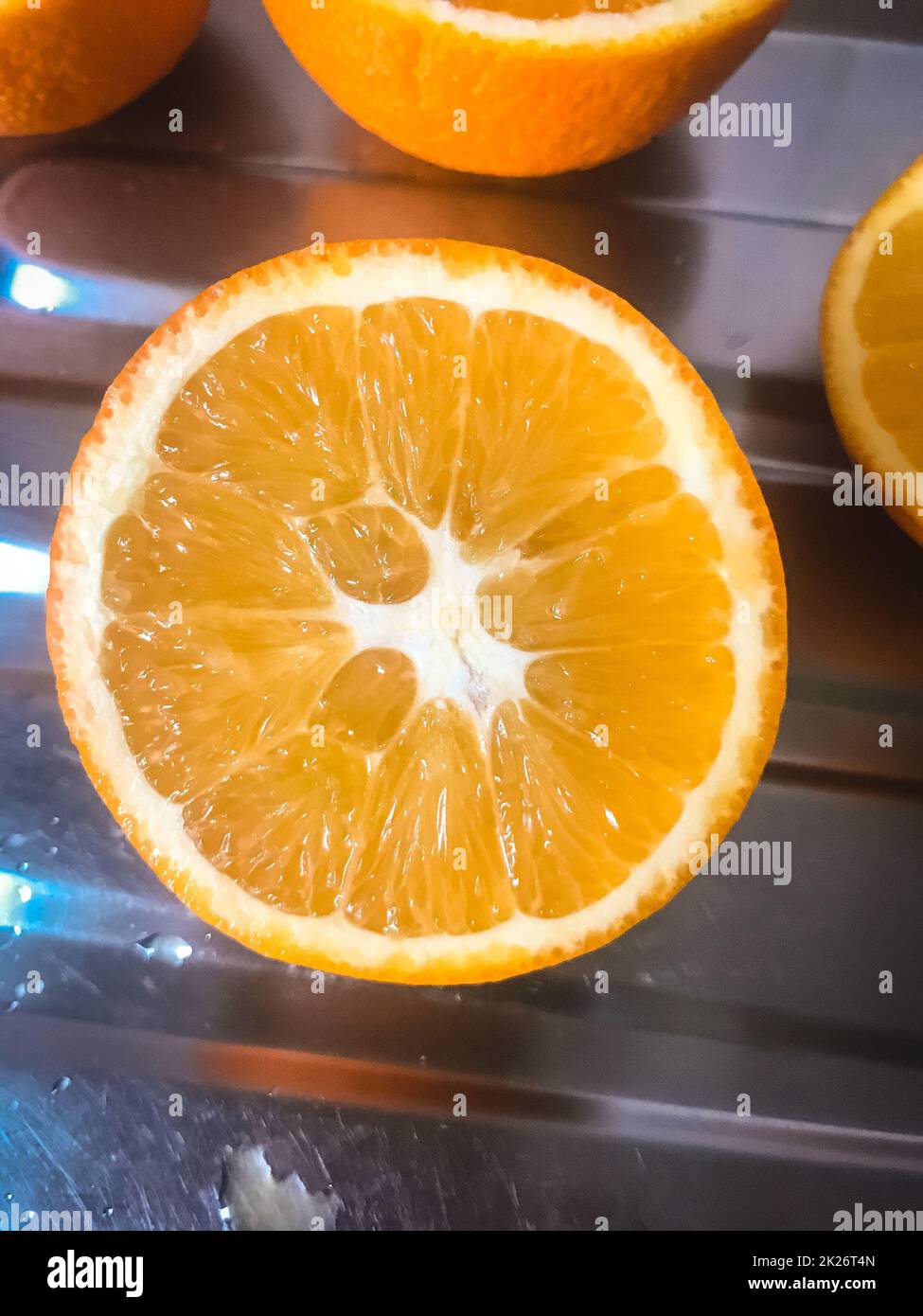 Orange slice in a kitchen Stock Photo - Alamy