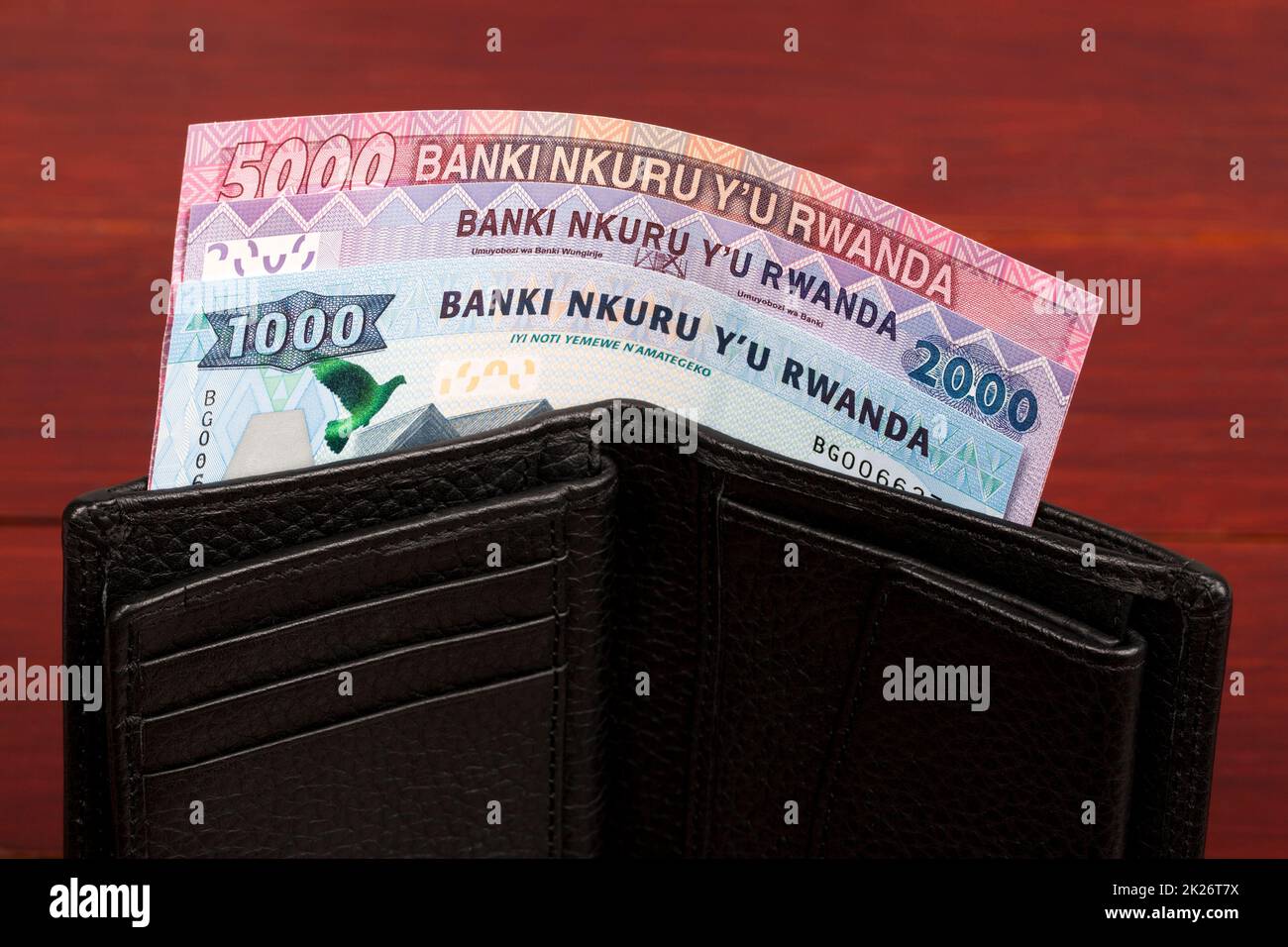 Rwandan money in the black wallet Stock Photo - Alamy