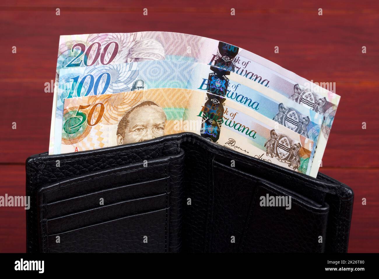 Botswana money in the black wallet Stock Photo - Alamy