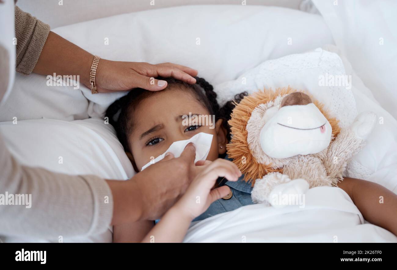 Sick child, concerned mother and covid symptoms while in bed for health ...