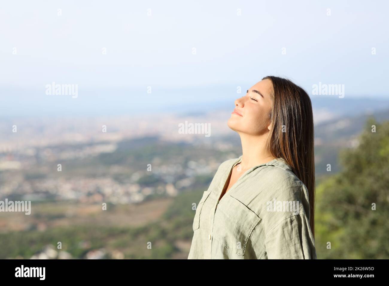 Teen is breathing fresh air in city outskirts Stock Photo - Alamy