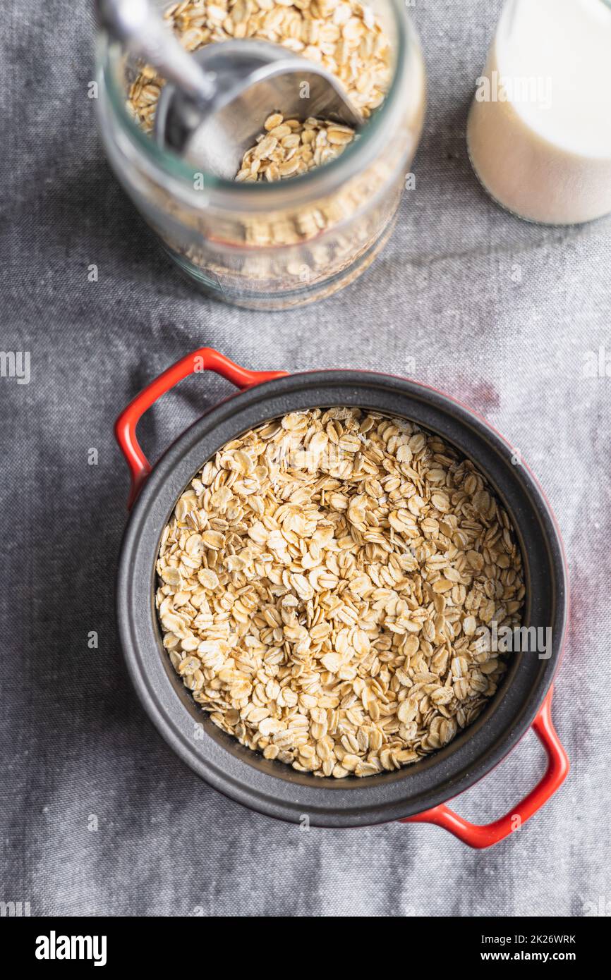 Breakfast cereals. Uncooked oatmeal. Raw oat flakes Stock Photo - Alamy