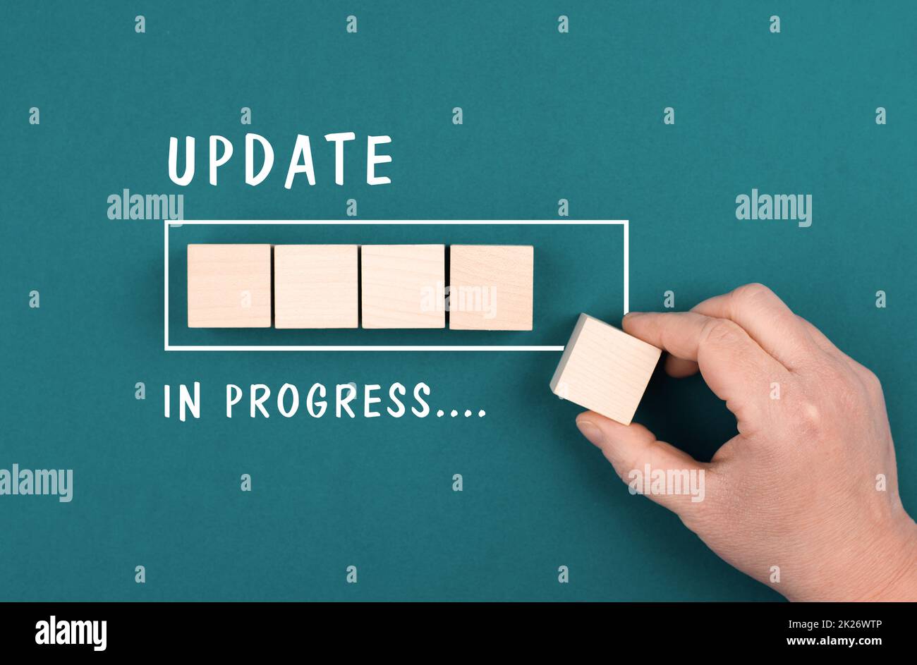The words update in progress are standing beside the loading bar, hand ...