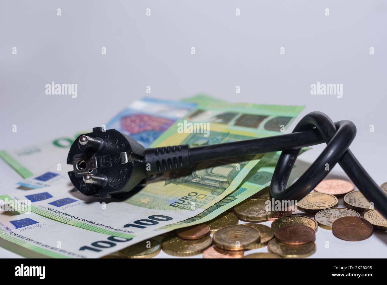 Energy prices increase and energy consumption power cable with knot and ...