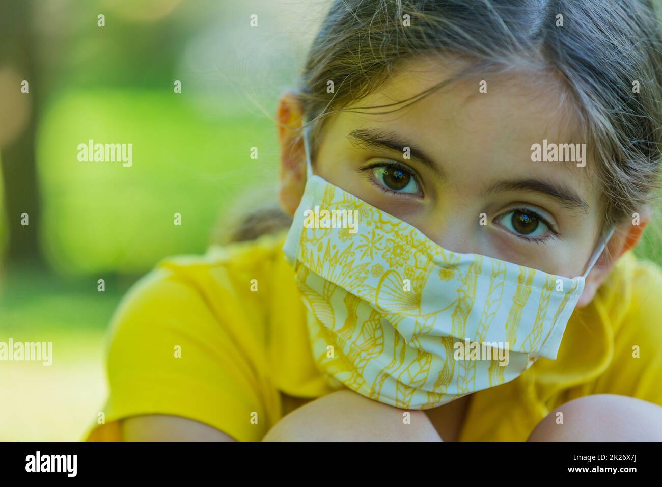 Little girl with mask Stock Photo - Alamy