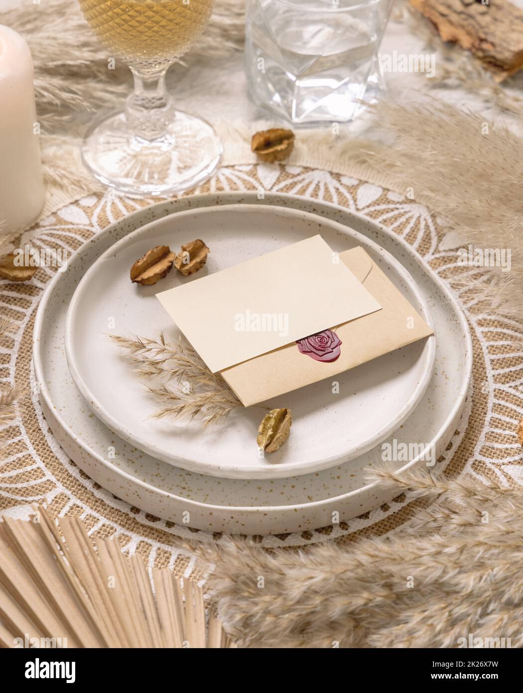 Boho Wedding Table place with Blank card over envelope near pampas ...