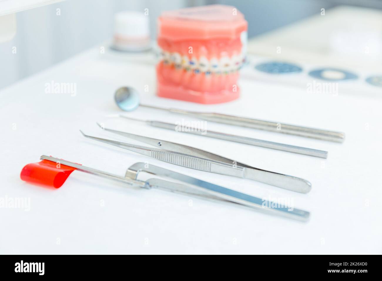 Artificial teeth model with dental equipment Stock Photo - Alamy