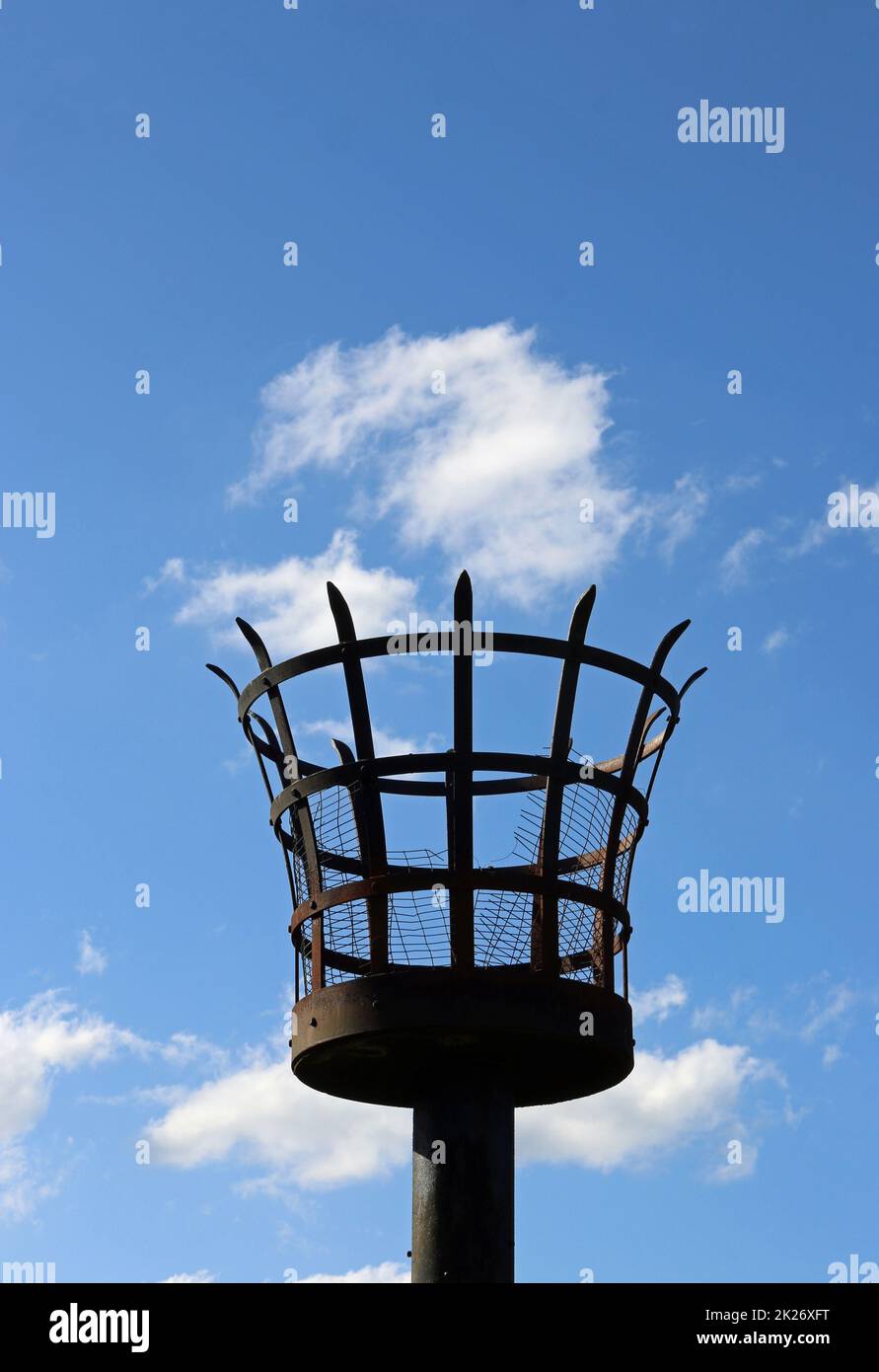 Metal basket fire beacon on pole Stock Photo - Alamy
