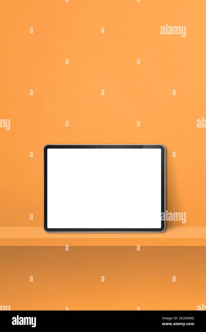 Digital tablet pc on orange wall shelf. Vertical background banner ...