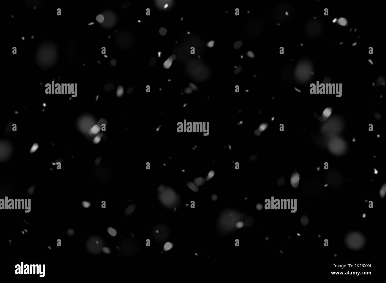 Real falling snow on a black background Stock Photo - Alamy