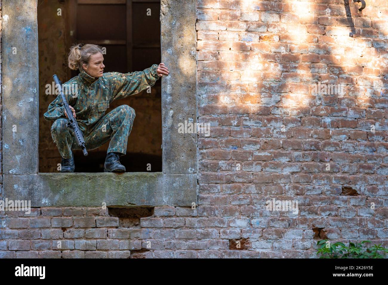 soldier training while playing paintball in the fortress Stock Photo ...
