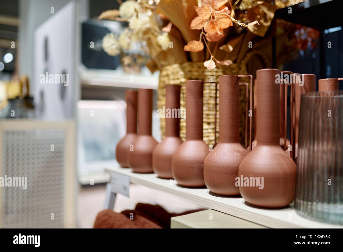 Porcelain vase shop assortment on shelves rack Stock Photo - Alamy