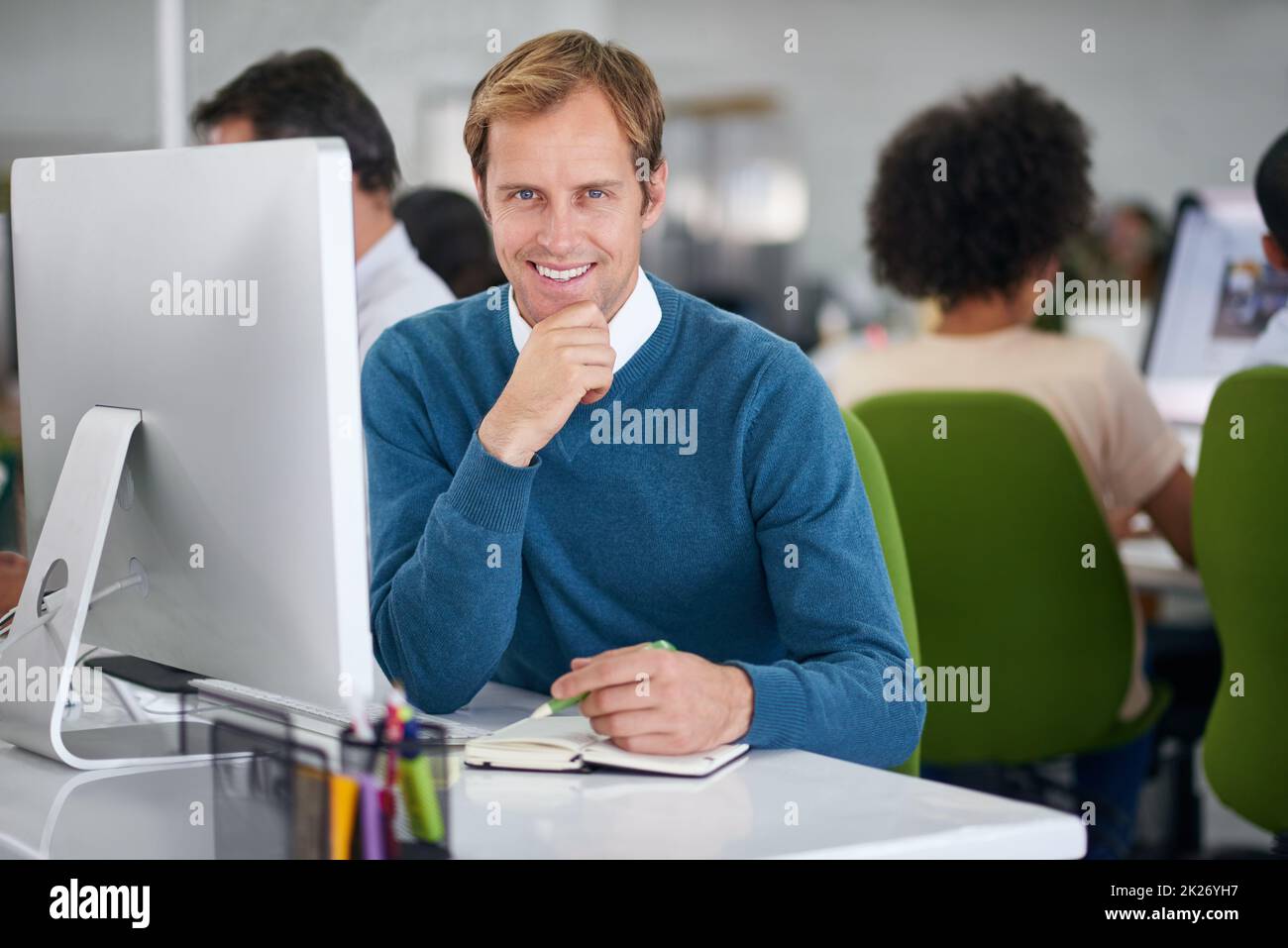 Reaching one goal after another. Portrait of a creative businessman ...