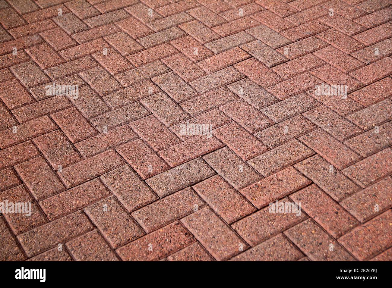 The pattern of a pink concrete outdoor walkway Stock Photo - Alamy