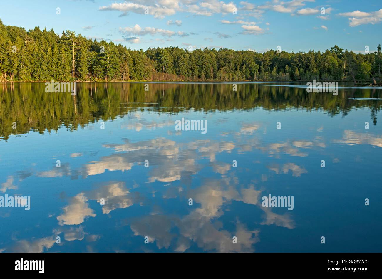 Reflections on lake while canoe hi-res stock photography and images - Alamy