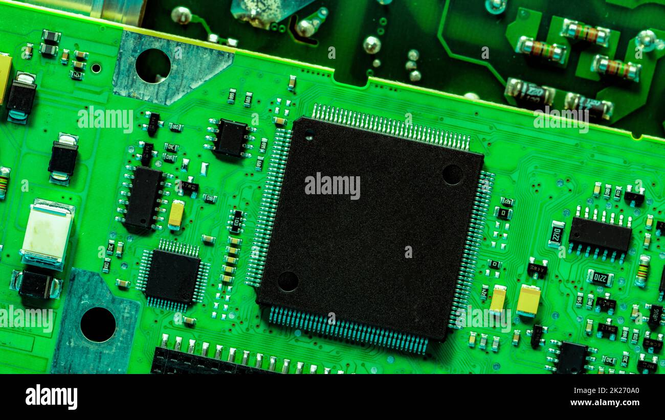 Ic on green circuit board hi-res stock photography and images - Alamy