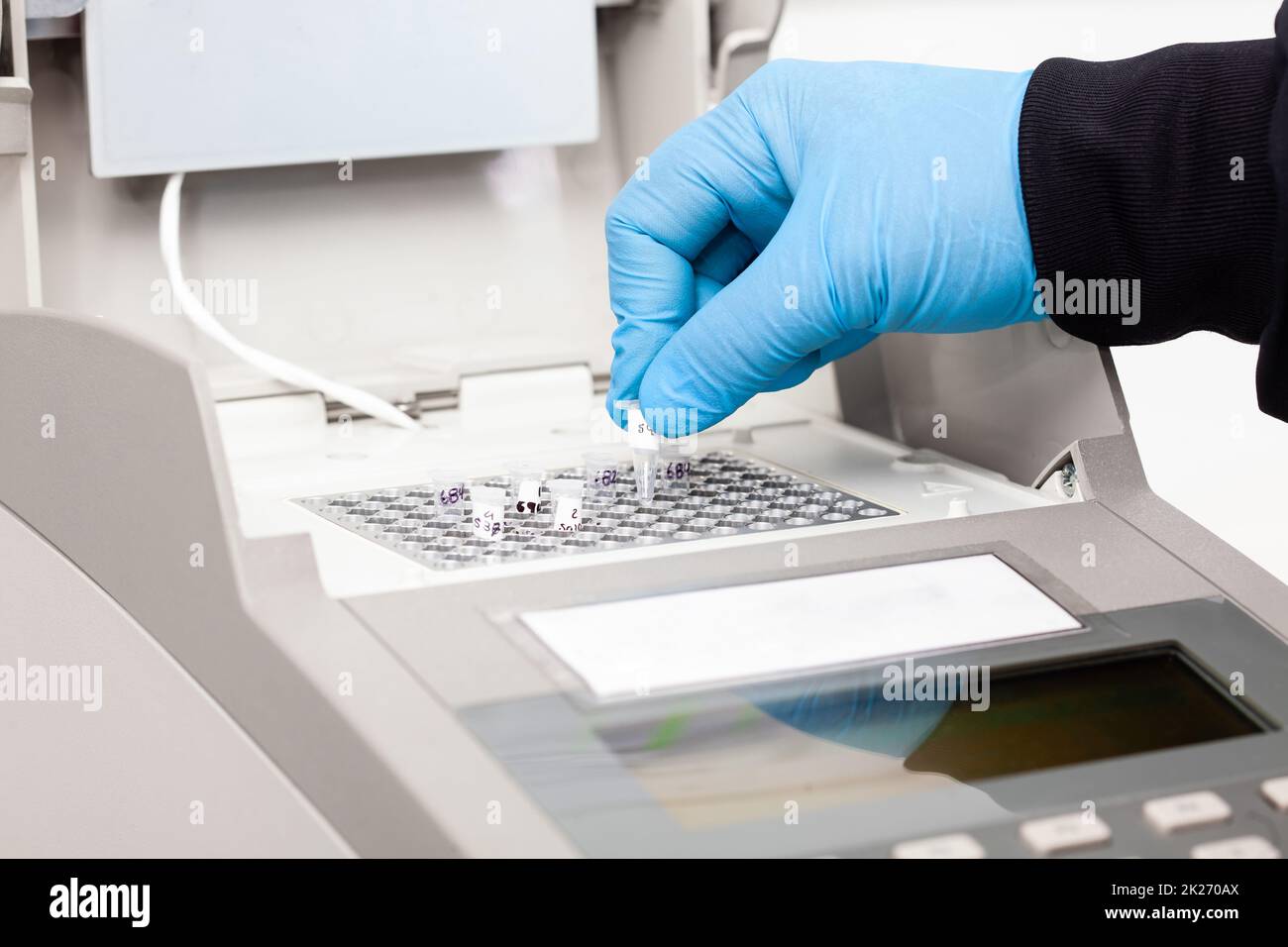 Closeup of a scientist hand while working at the laboratory with a ...