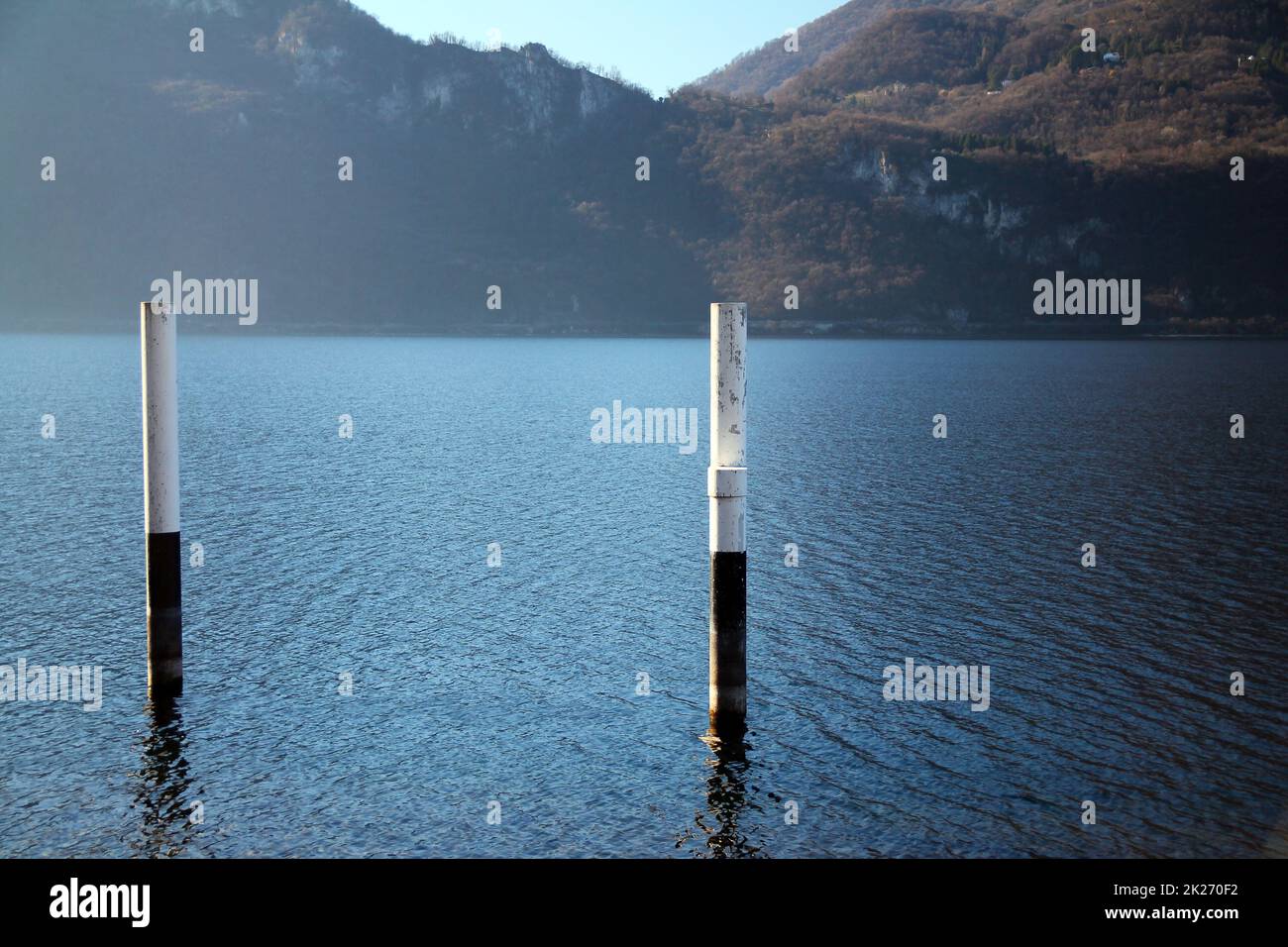Close up of the traditional black and white poles of a boat docking in ...