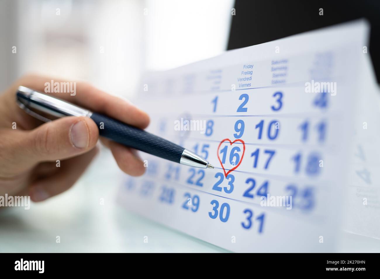 Hand marking calendar hi-res stock photography and images - Alamy