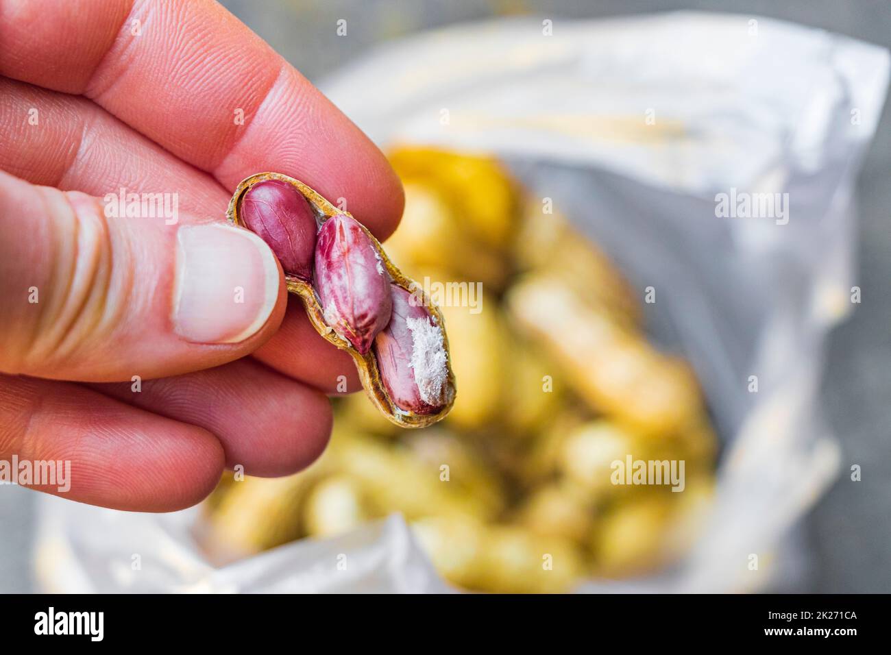 Red skin peanuts hi-res stock photography and images - Alamy