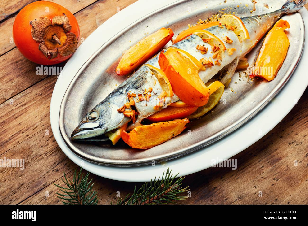 Grilled mackerel fish with persimmon Stock Photo - Alamy