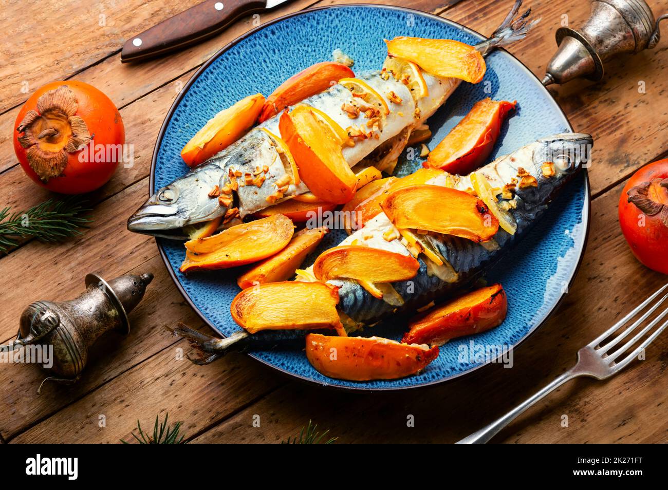 Grilled mackerel fish with persimmon Stock Photo - Alamy