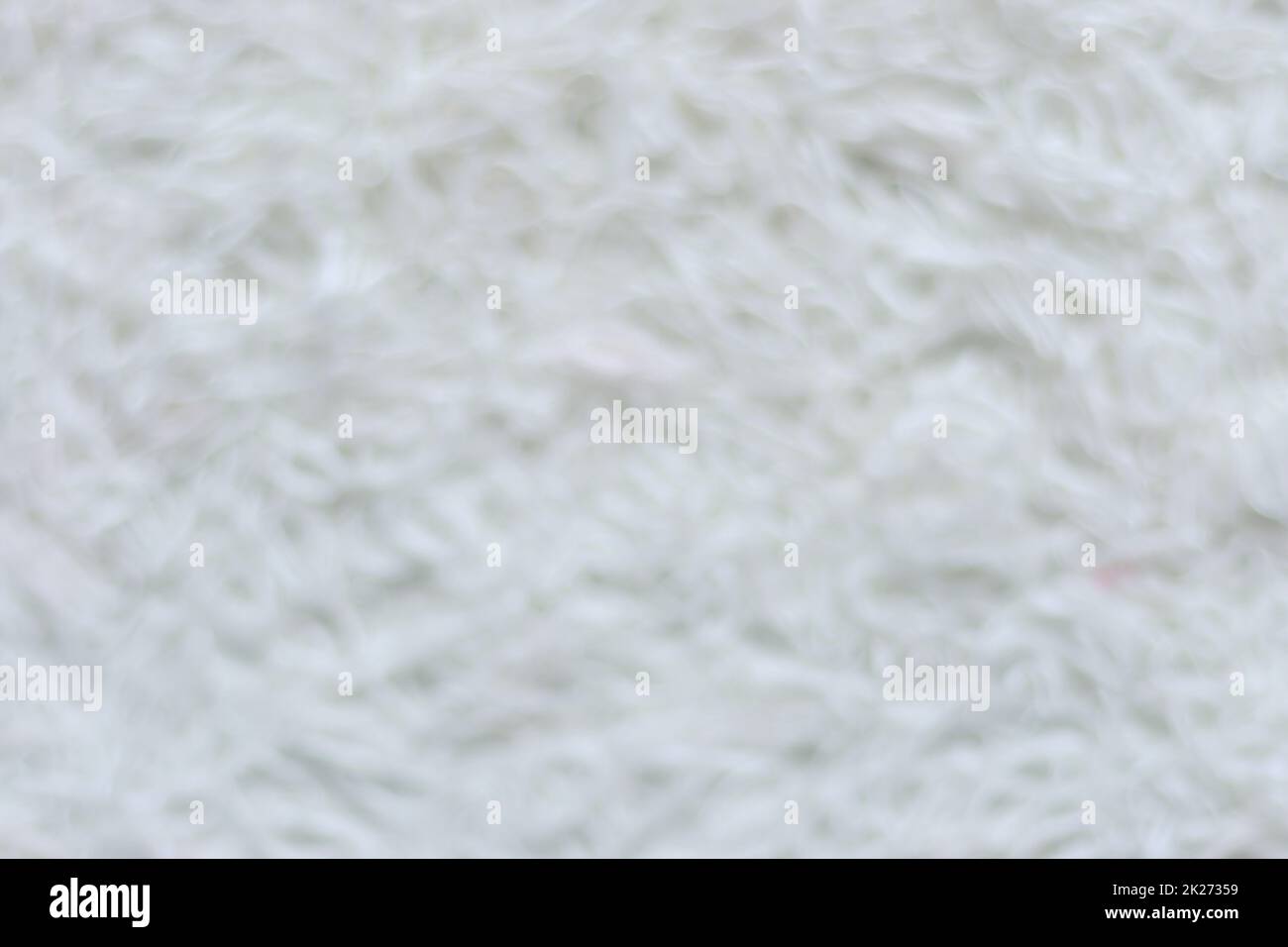 Blurred background white rubber band with lots of white on floor is ...