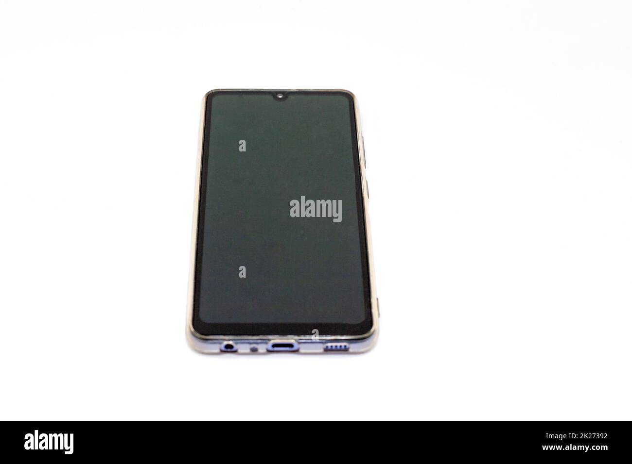 Smartphone frame less lockscreen. Standing on the corner, isolated on ...