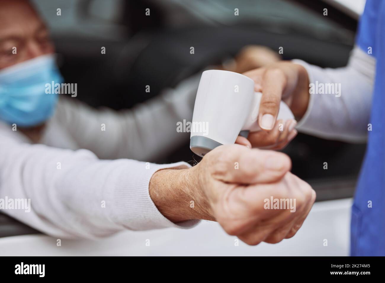 Just making sure your temperature is normal Stock Photo - Alamy