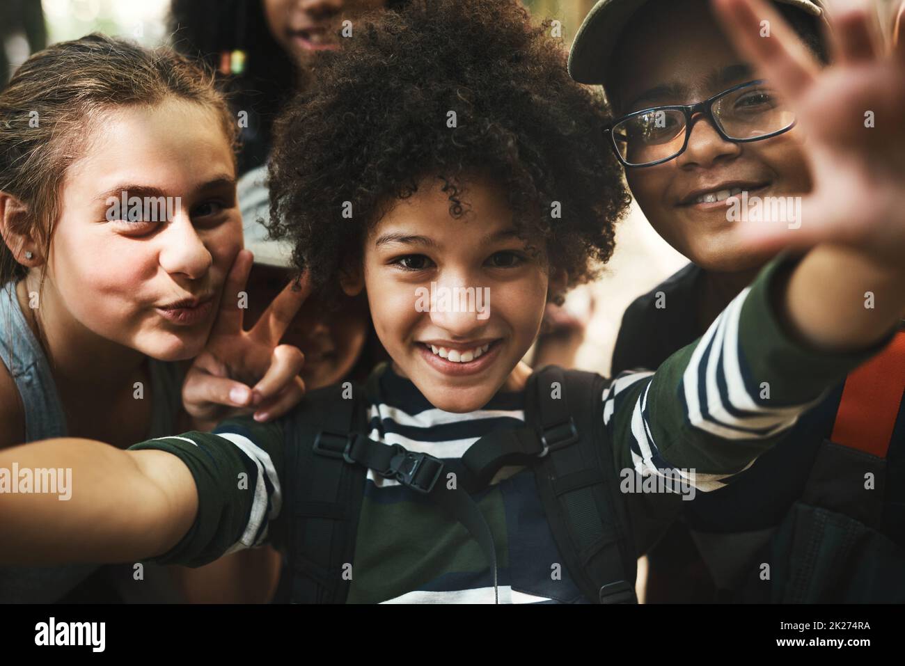 First Selfie Of Summer Camp Shot Of A Group Of Teenagers Taking A Selfie At Summer Camp Stock