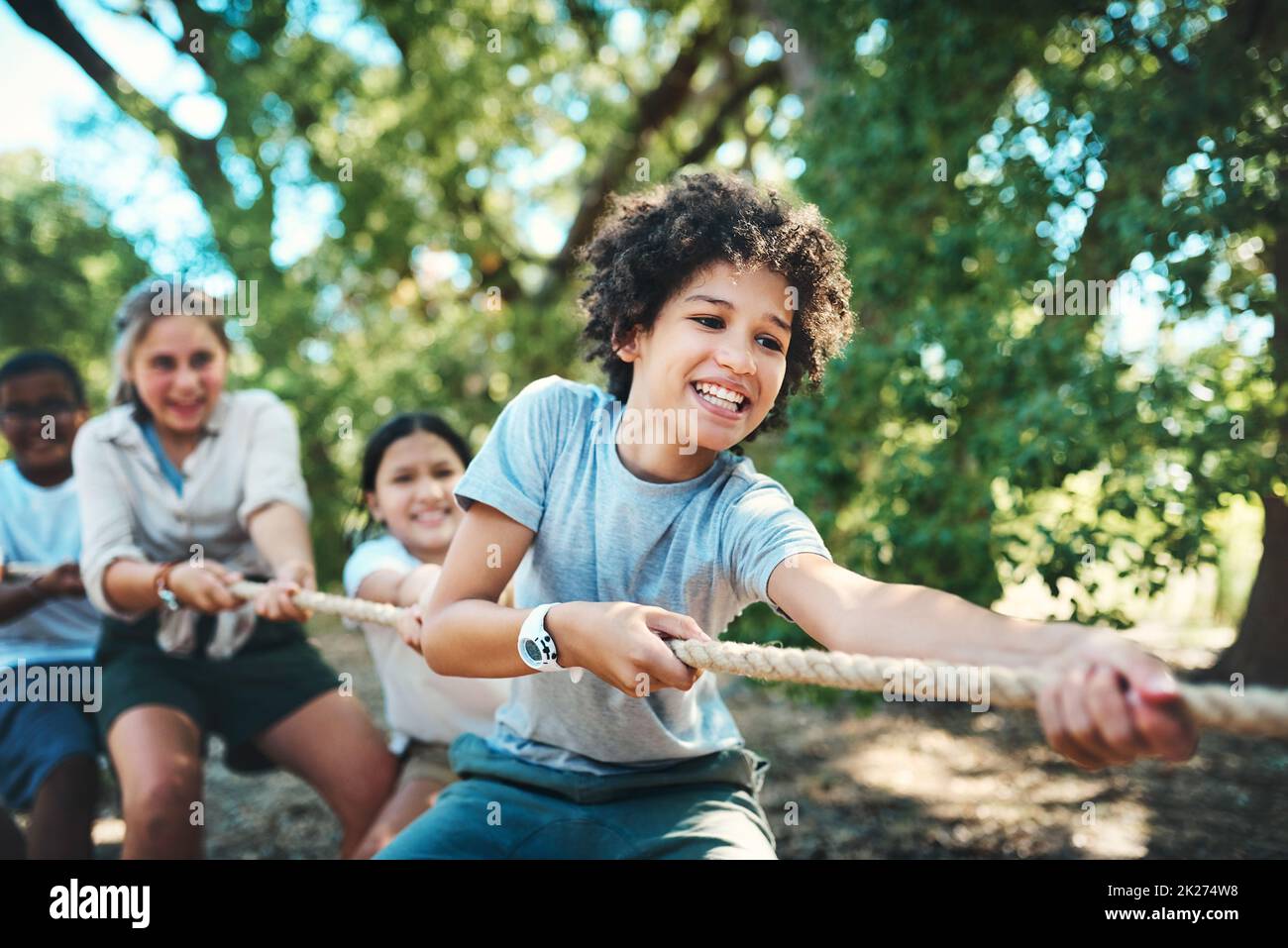 Playing tug war hi-res stock photography and images - Alamy