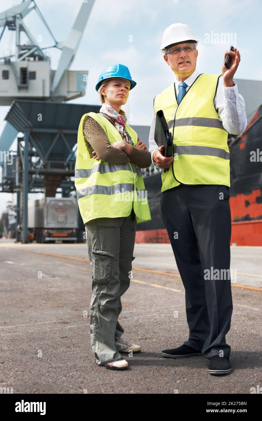 Engineers standing crane ship hi-res stock photography and images - Alamy