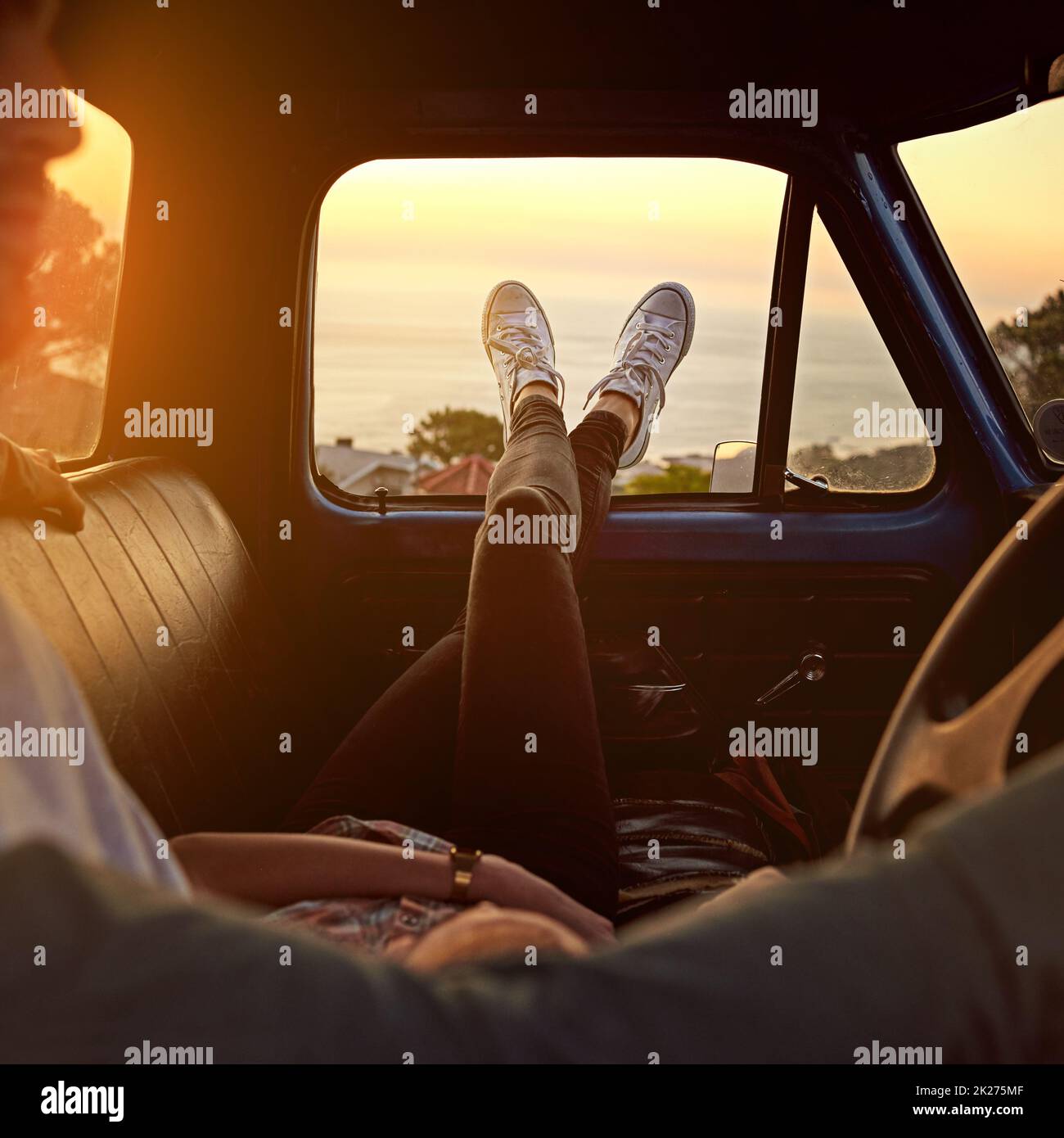 Woman feet up outside hi-res stock photography and images - Alamy