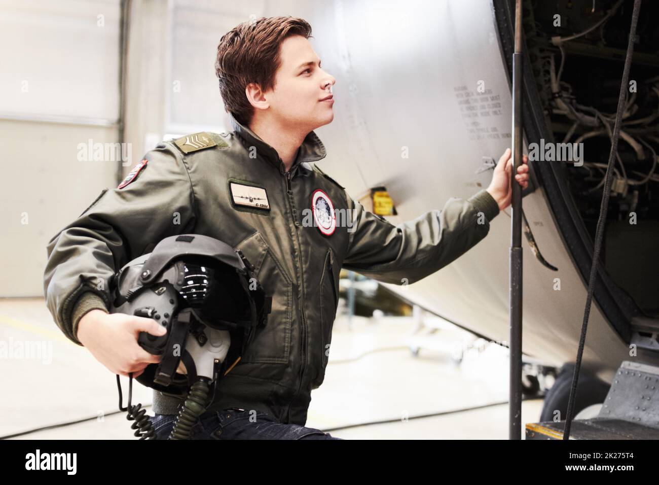 Up we go. A pilot on his way into his plane Stock Photo - Alamy