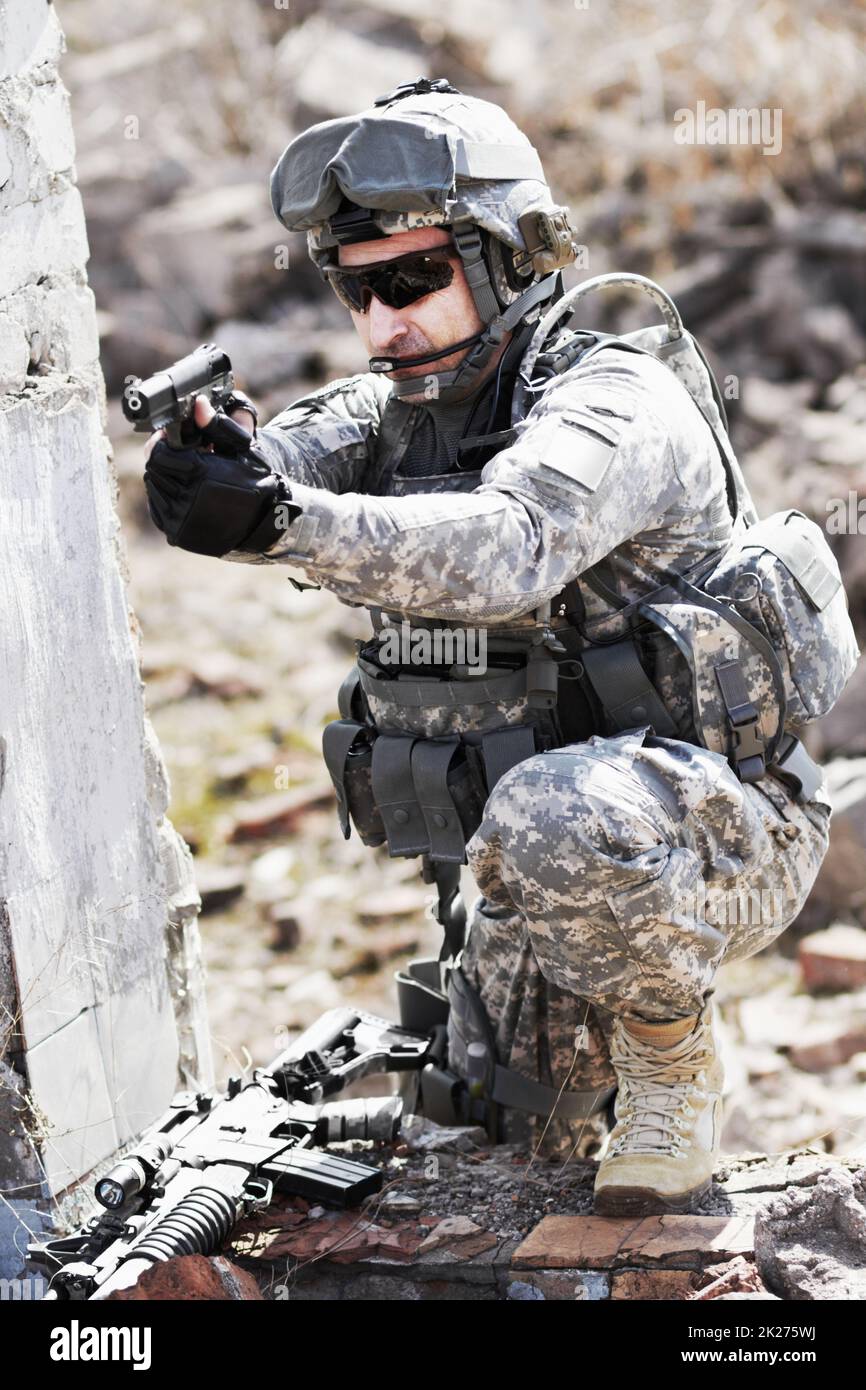 Soldier pointing machine gun hi-res stock photography and images - Alamy